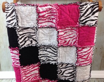 Items similar to Pink Zebra Rag Quilt on Etsy