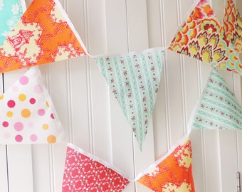 Mini pennant fabric banner bunting in yellow pink orange