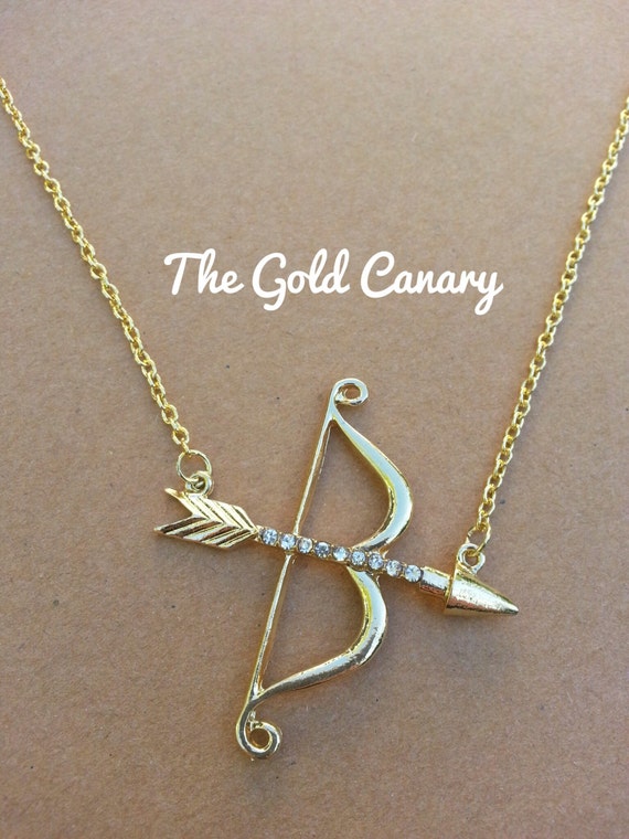 Items similar to Gold Arrow Necklace on Etsy