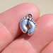 BULK 50 Little Silver Feet Charms SC1891
