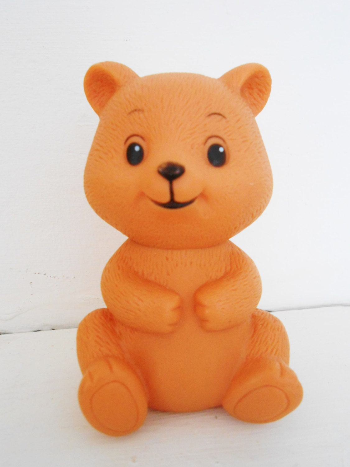 Vintage Orange/ Brown Hard Plastic Bear Cub Rubber Toy from