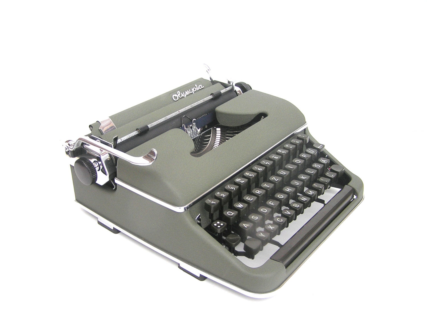 Olympia vintage working typewriter teal green superb working condition ...