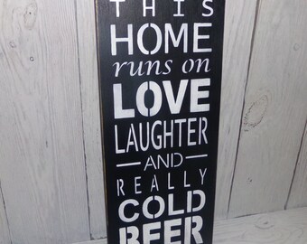 This Home Runs On Love Laughter and Really Cold Beer Sign