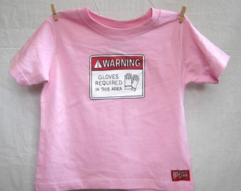 A humorous warning label clothing line for kids by HazardBaby