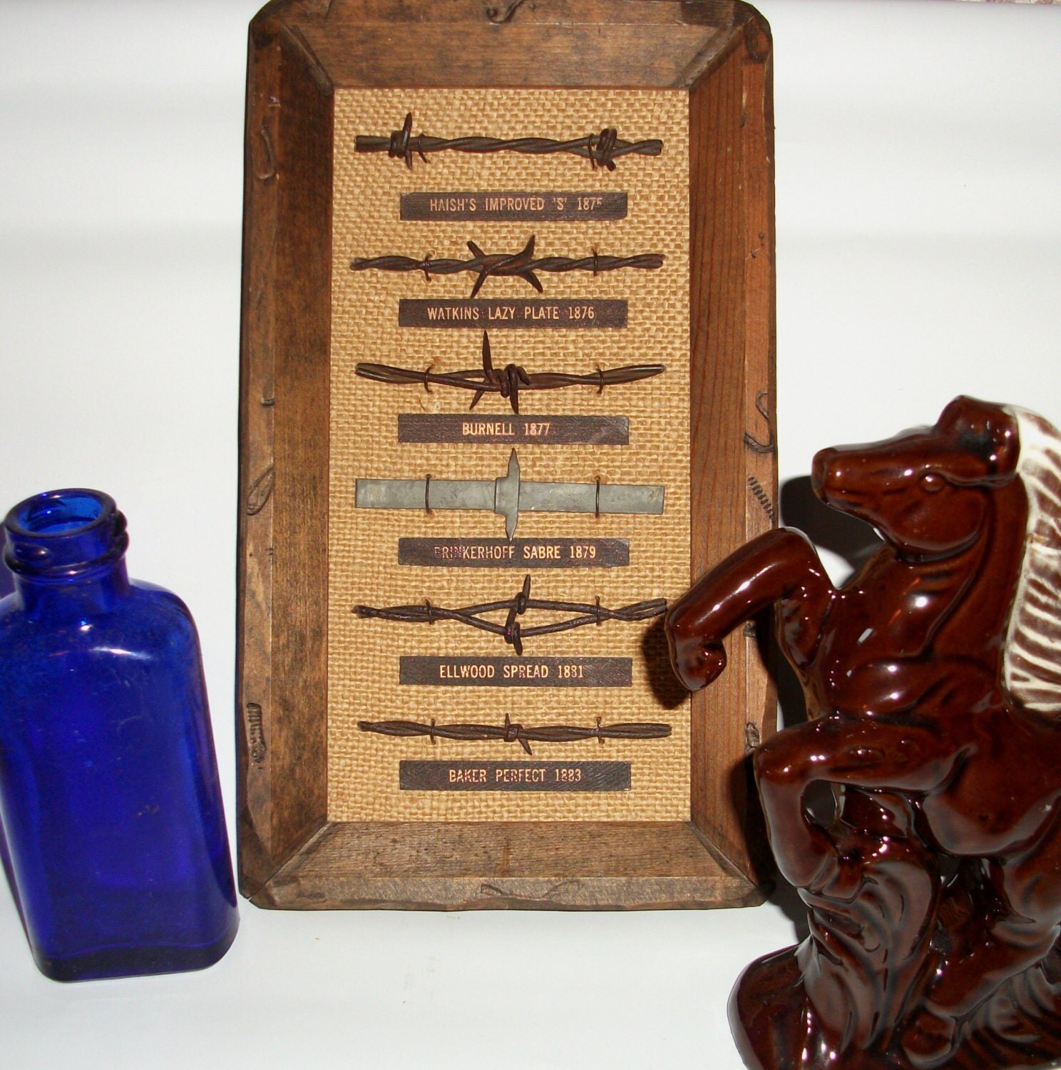 Vintage barbed wire collection wall plaque carved wood and