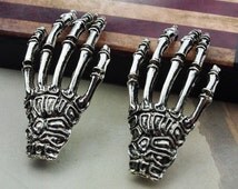 Unique silver skeleton hand related items | Etsy