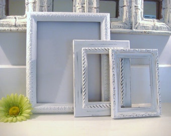 white frames, shabby chic frames, ornate frames, nursery decor ...