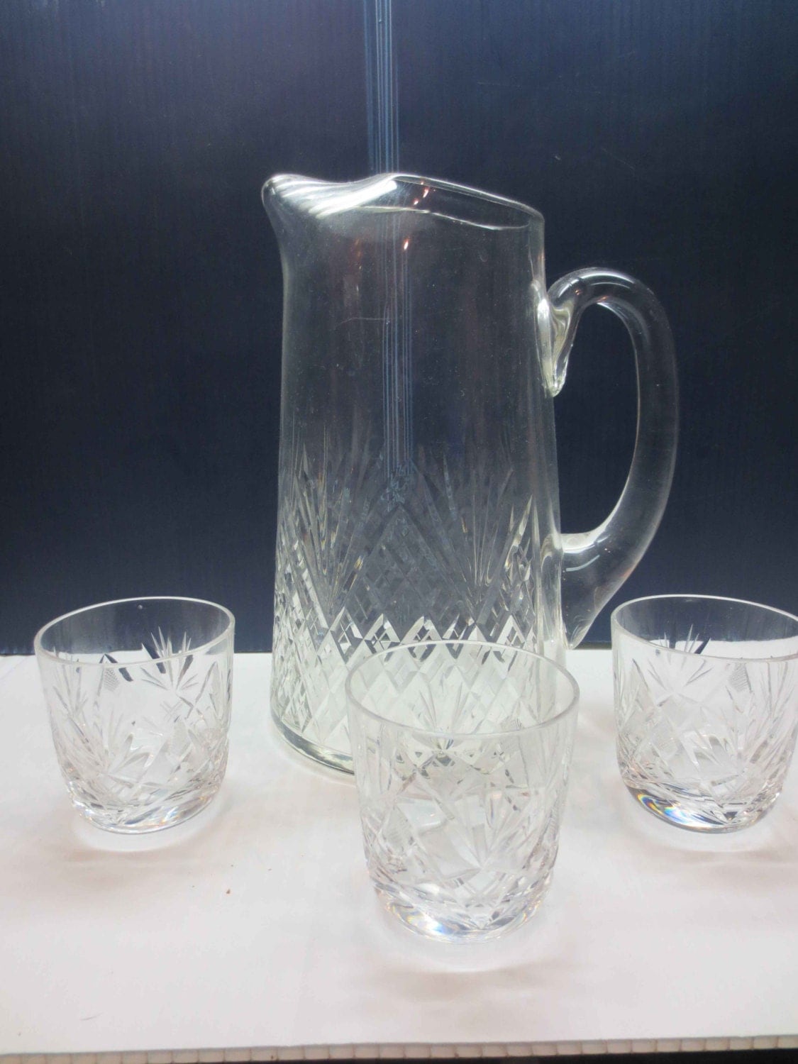 Cut Glass Pitcher and 3 Small Cut Glass Glasses