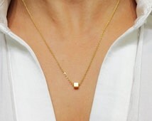 Popular items for gold cube necklace on Etsy