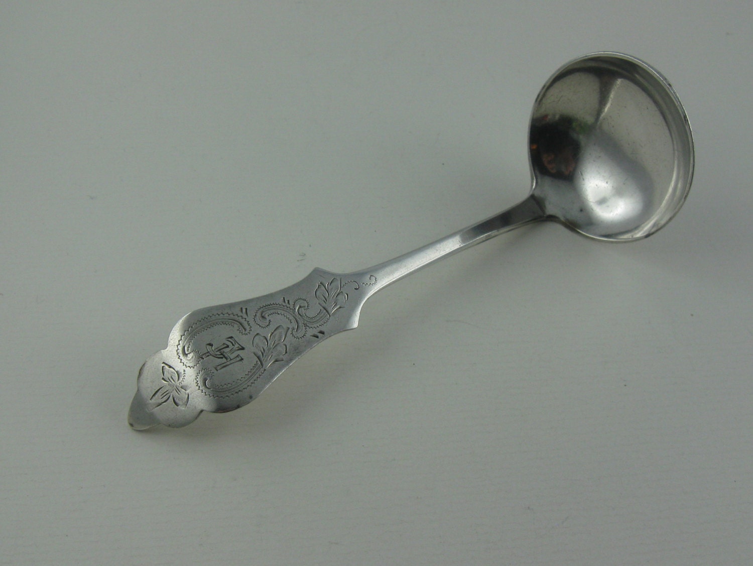 12% OFF. Antique cream spoon made of silver (Ag 800). Decor: Classic ...