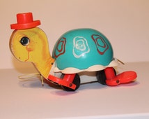 Popular items for turtle pull toy on Etsy