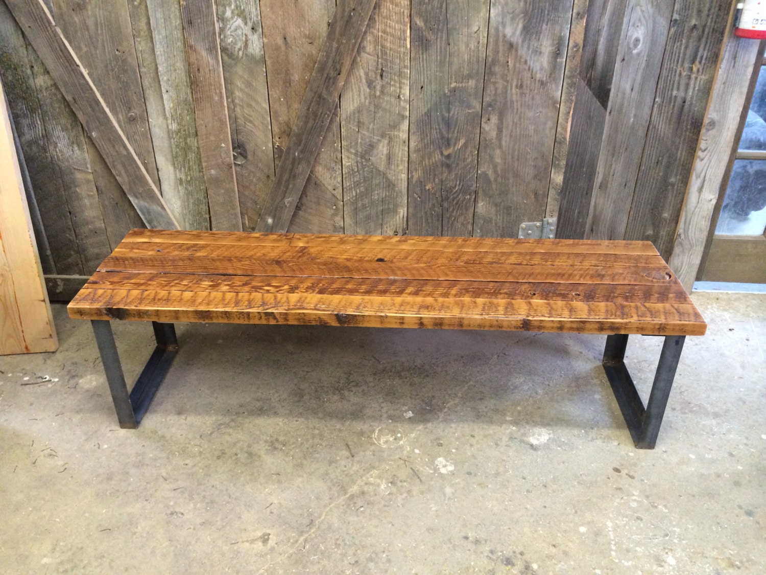 Reclaimed Douglas-fir bench with welded steel base