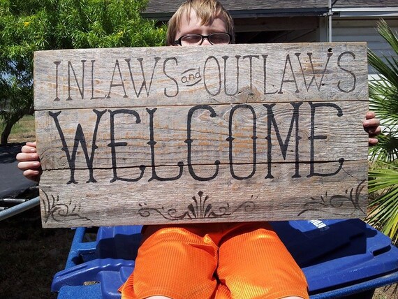 Items similar to Rustic Wood Sign" Inlaws and Outlaws Welcome "30 in x ...