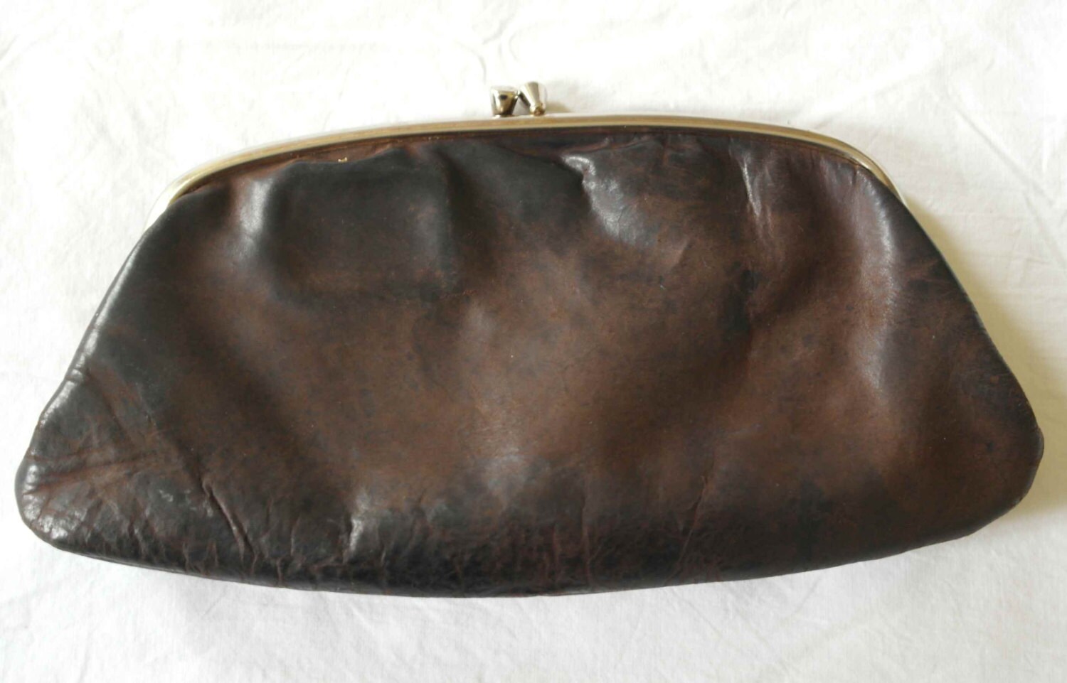 Vintage Leather coin purse with clasp closure.