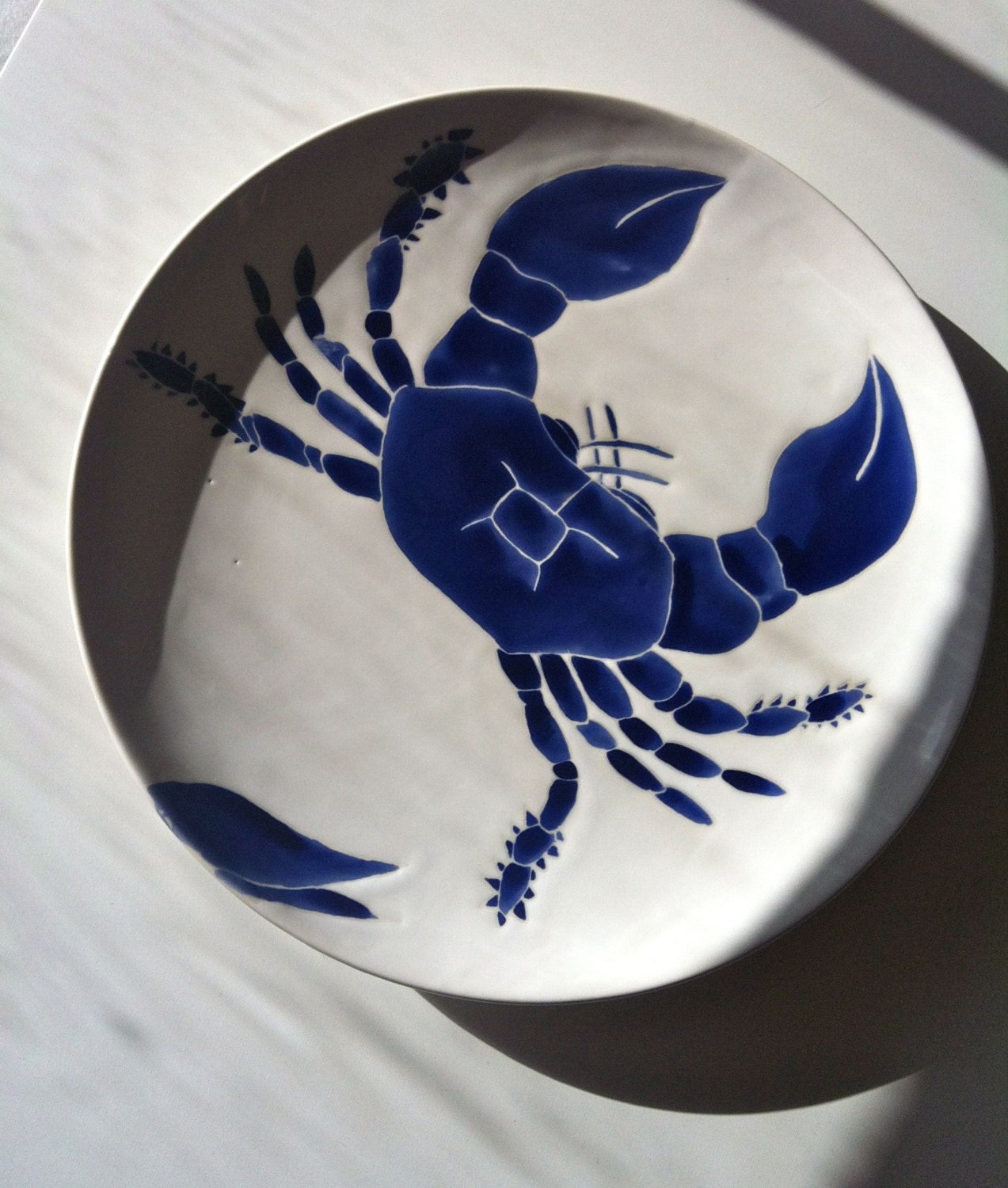 Navy blue crab ceramic round serving platter