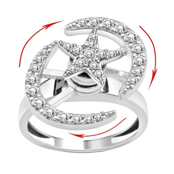 Items similar to Rings of year white color stone motion Dancing ...
