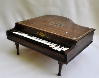 Popular items for toy piano on Etsy
