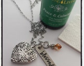 Items similar to Essential Oil diffuser locket with personalized tag on ...