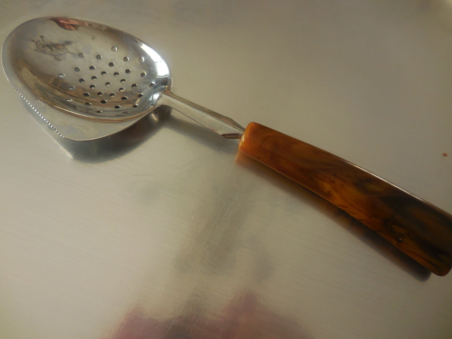 Stainless Bakelite Strainer Spoon – Haute Juice