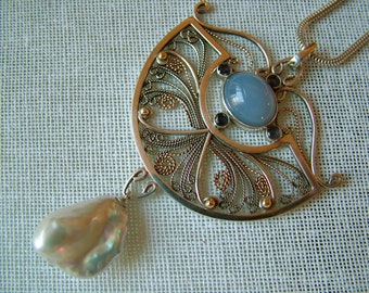 Contemporary silver and gemstone jewelry by Nina Lara by ninalara