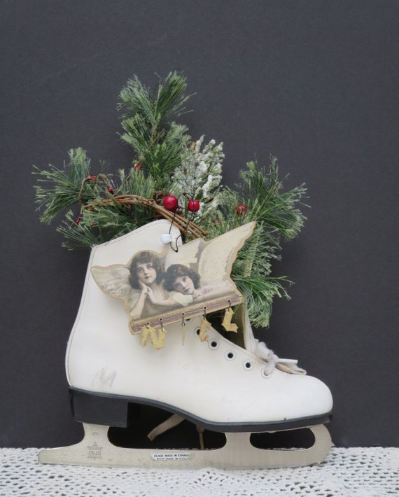Vintage Victorian Decorated Ice Skate With Angels by GlitteryJunk