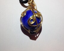 Popular items for wire wrapped marbles on Etsy