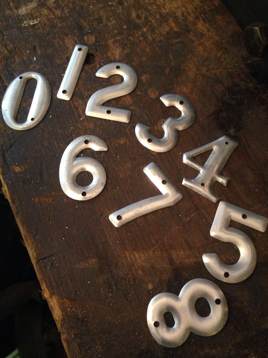 Vintage industrial metal numbers old metal numbers