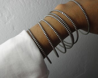 Set of 7 handmade sterling silver bangle bracelets