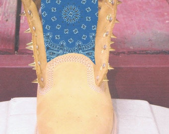 Popular items for spiked timberlands on Etsy