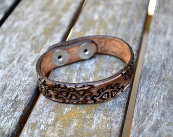 Embossed bracelet | Etsy