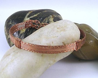 Subtle Wavy Rings in Twisted and Plain. Available in Copper