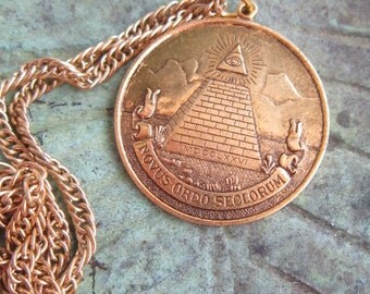 Popular items for illuminati jewelry on Etsy