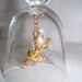 Gold Charm Crystal Disney Bell W/ Daisy Duck New England