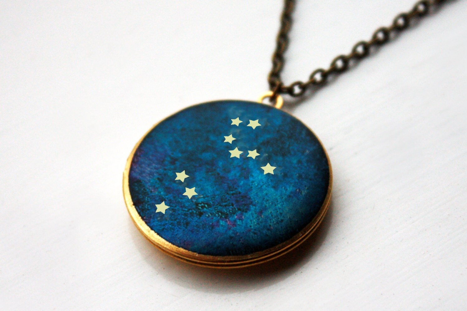 Leo Constellation illustrated brass locket by HiddenTales on Etsy