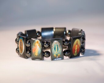 Popular items for saint bracelet on Etsy