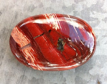 Large polished red jasper palm stone ~ root chakra stone