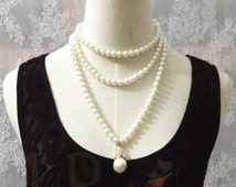 Popular items for long strand pearls on Etsy