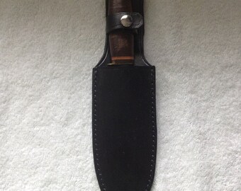 Hand tooled leather knife sheath with mountain lion
