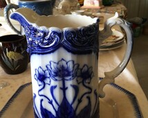 Popular items for flow blue pitcher on Etsy