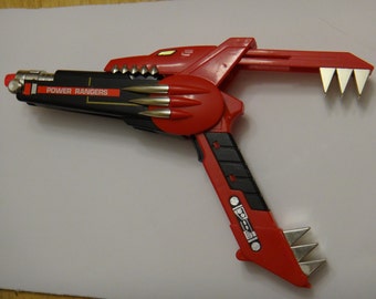 red ranger toy gun on Etsy, a global handmade and vintage marketplace.