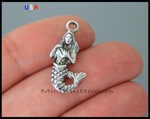 Popular items for silver mermaid charm on Etsy
