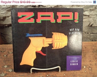 ON SALE vintage 80's "ZAP Ray Gun" collector's book by Leslie Singer ...
