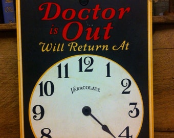 Vintage "THE Doctor is IN/OUT" reversible sign with adjustable clock