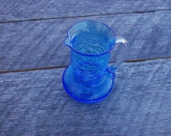 Popular items for blue glass pitchers on Etsy
