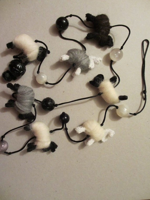 Sheep string hand made from British fleece. A long vertically