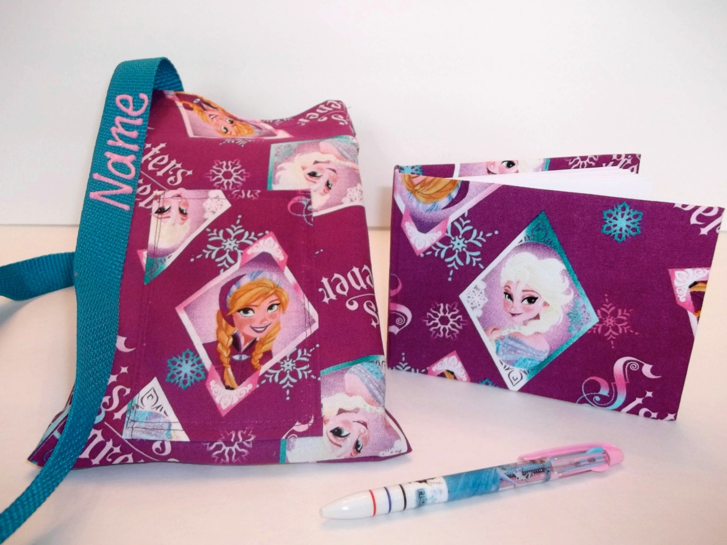 Disney Frozen Anna and Elsa autograph book bag with book and