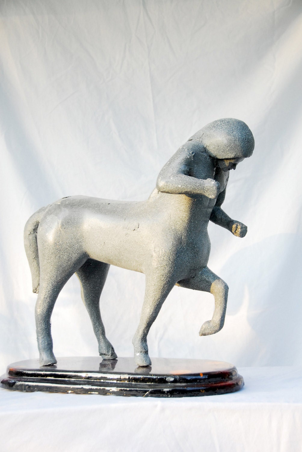 male centaur sculpture stone finish