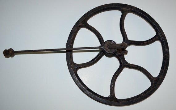 Vintage treadle sewing machine drive pulley wheel
