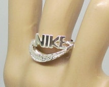Popular items for nike ring on Etsy