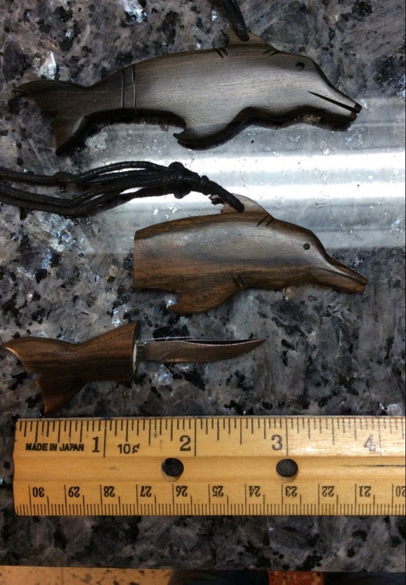 Items similar to Dolphin necklace on Etsy